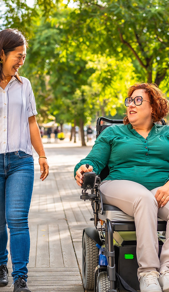 woman-with-disability-talking-while-walking-along - Funds In Court